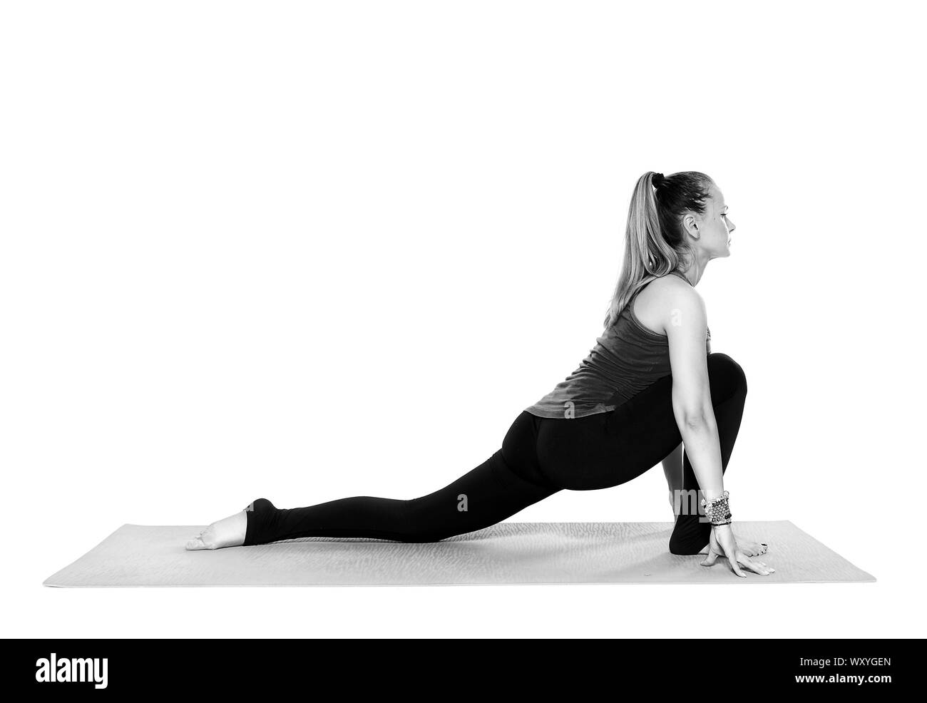 Woman yoga teacher in various poses (asana) isolated on white ...