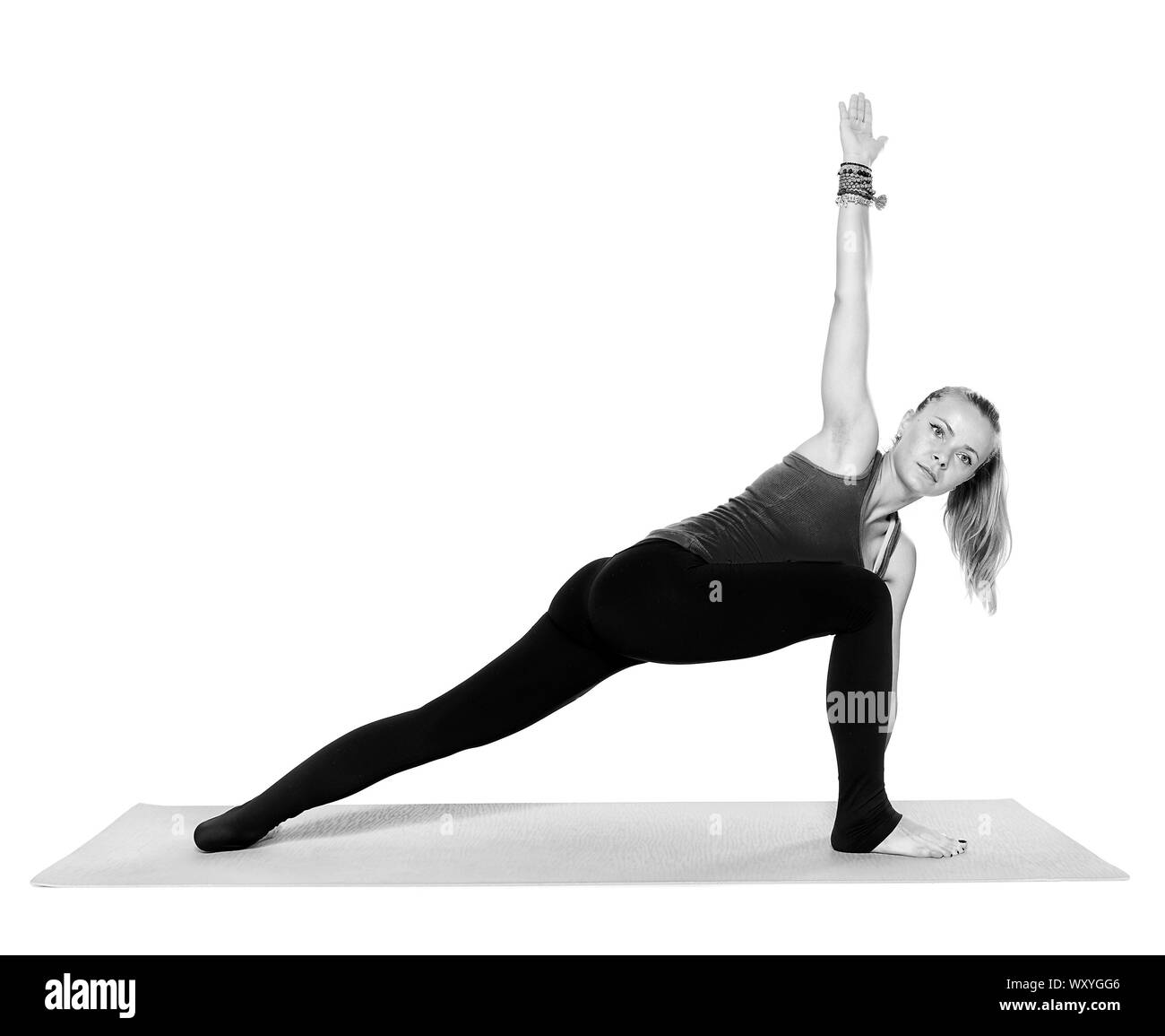 Woman yoga teacher in various poses (asana) isolated on white ...