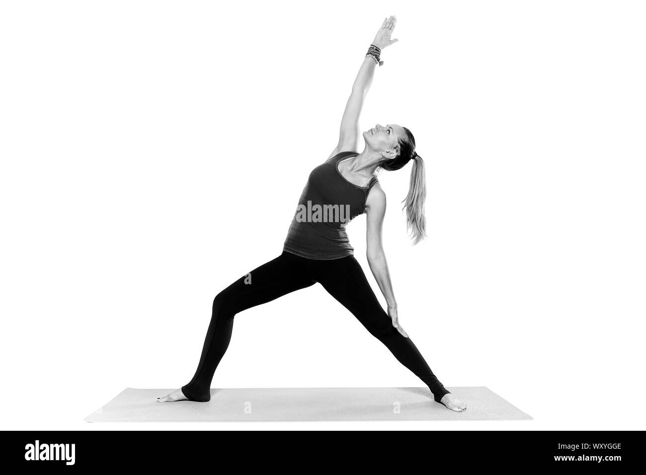 Woman yoga teacher in various poses (asana) isolated on white ...