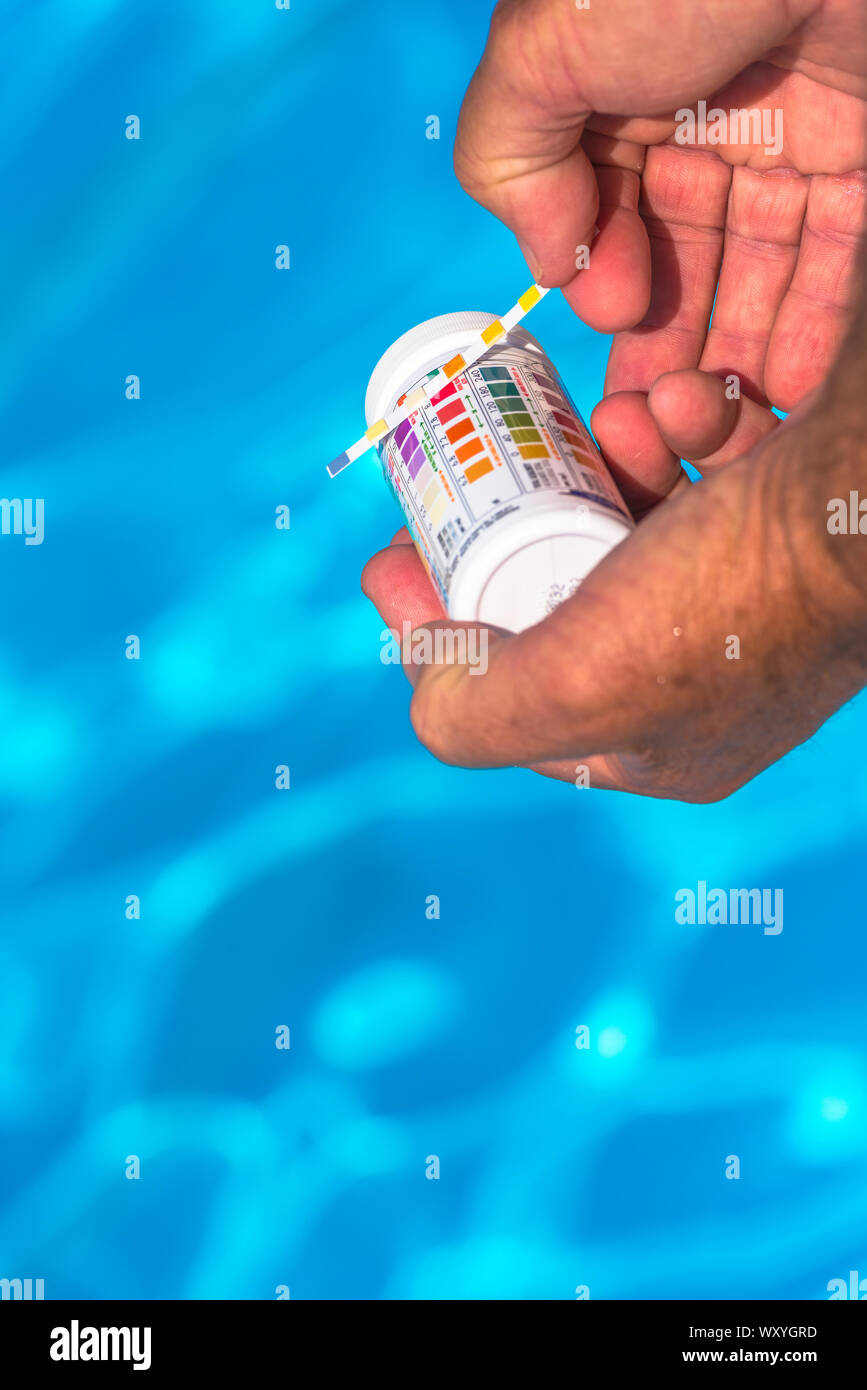 Check the Ph of a private swimming pool Stock Photo - Alamy