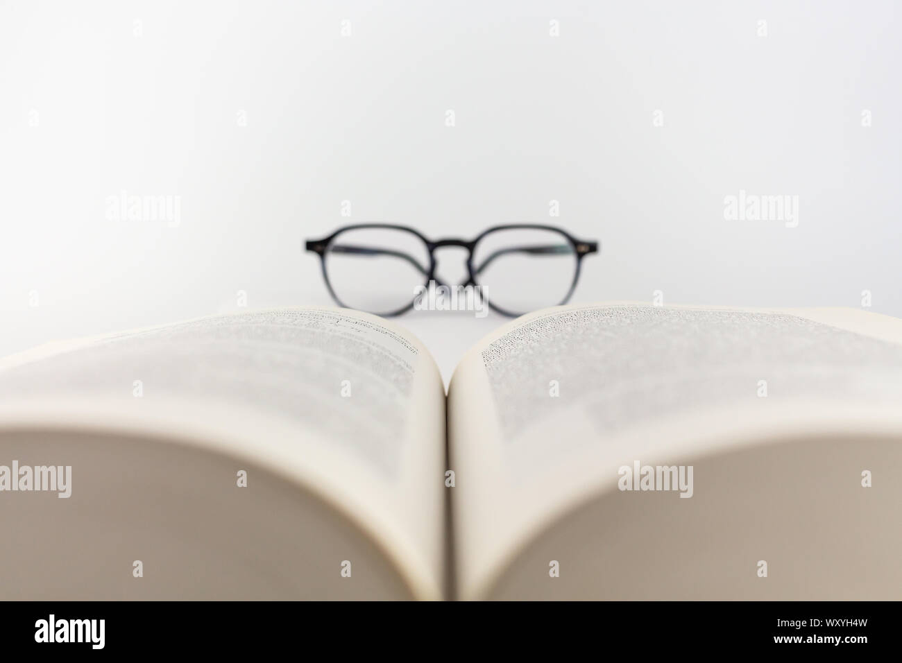Open book glasses hi-res stock photography and images - Alamy