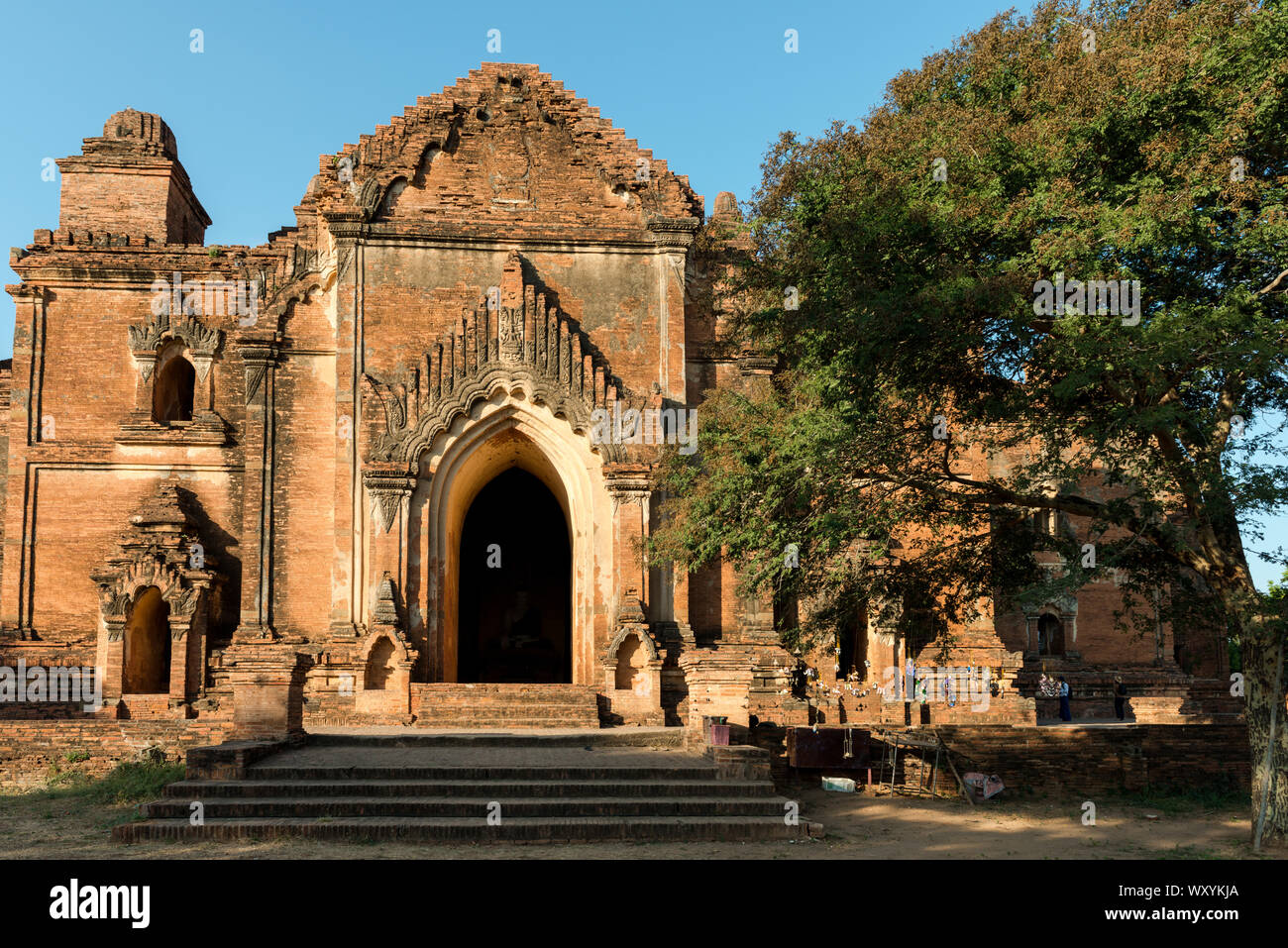 Wide angle picture of the entrance of the huge architecture Dhammayan ...