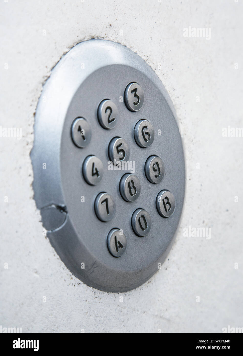 Security access with keypad on the wall Stock Photo - Alamy