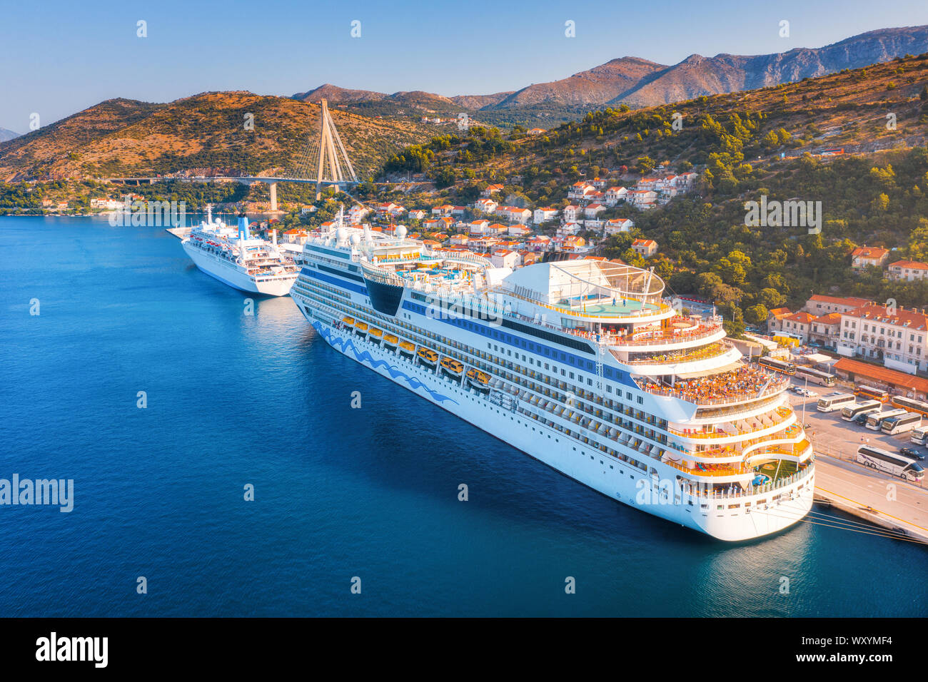 Aerial view of beautiful large white cruise ships at sunset Stock Photo ...