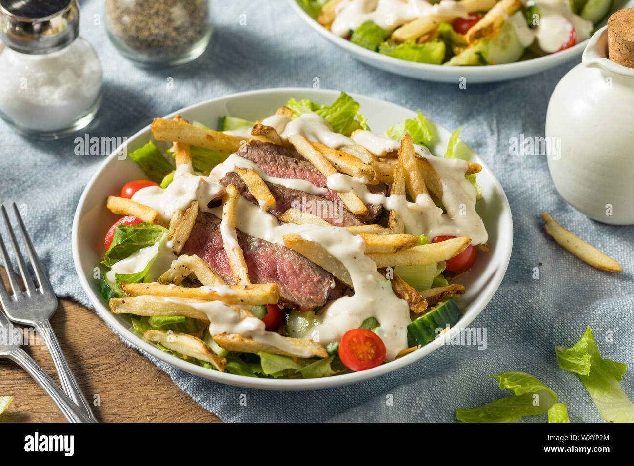 Homemade Pittsburgh Salad with Steak and French Fries Stock Photo - Alamy