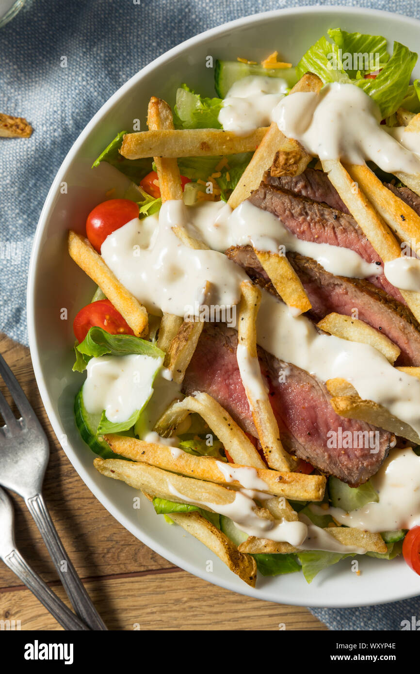 Homemade Pittsburgh Salad with Steak and French Fries Stock Photo - Alamy