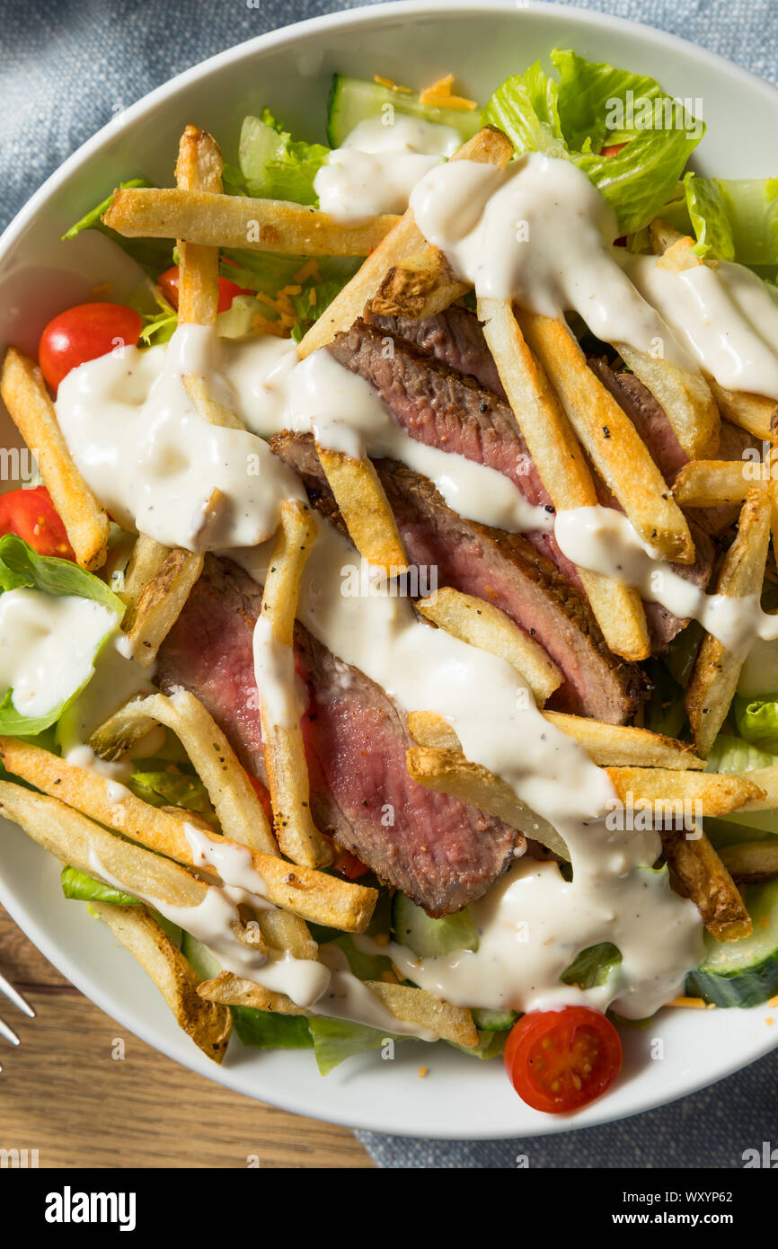Homemade Pittsburgh Salad with Steak and French Fries Stock Photo - Alamy