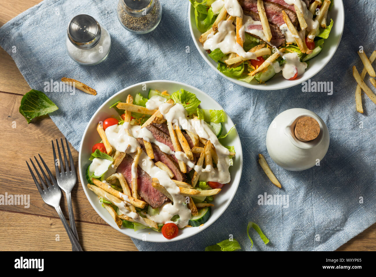 Homemade Pittsburgh Salad with Steak and French Fries Stock Photo - Alamy