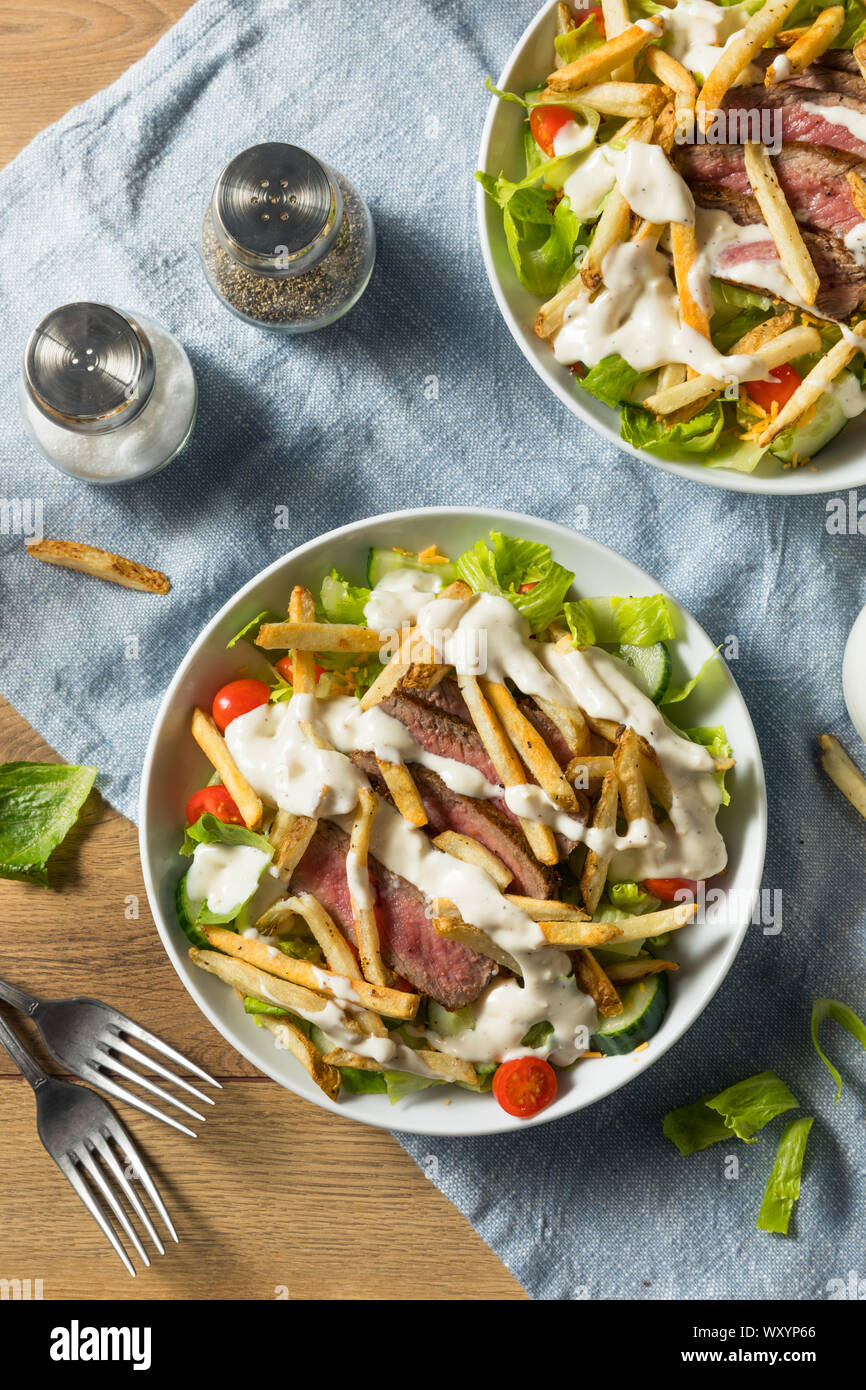 Homemade Pittsburgh Salad with Steak and French Fries Stock Photo - Alamy