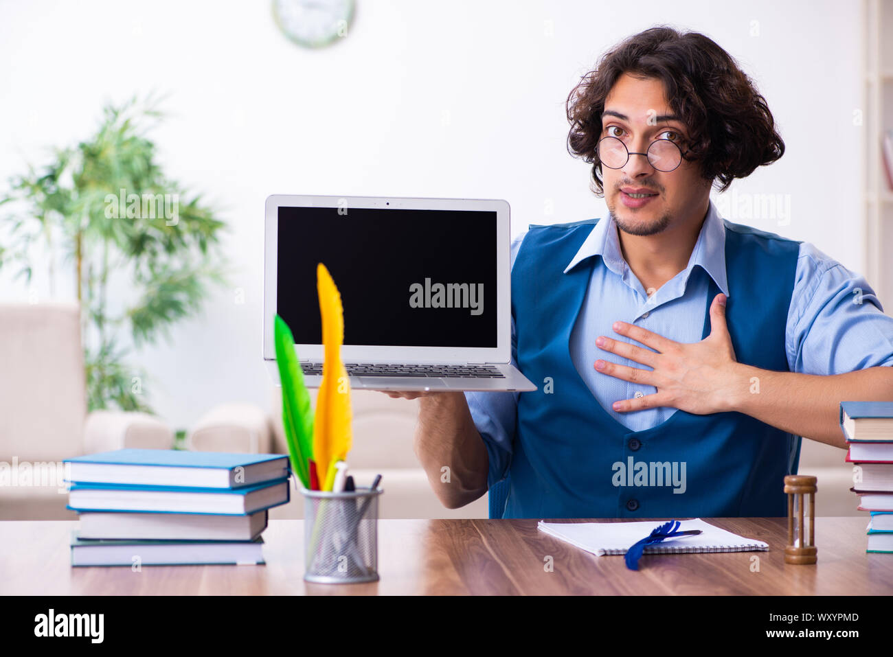 The young writer working on his new work Stock Photo - Alamy