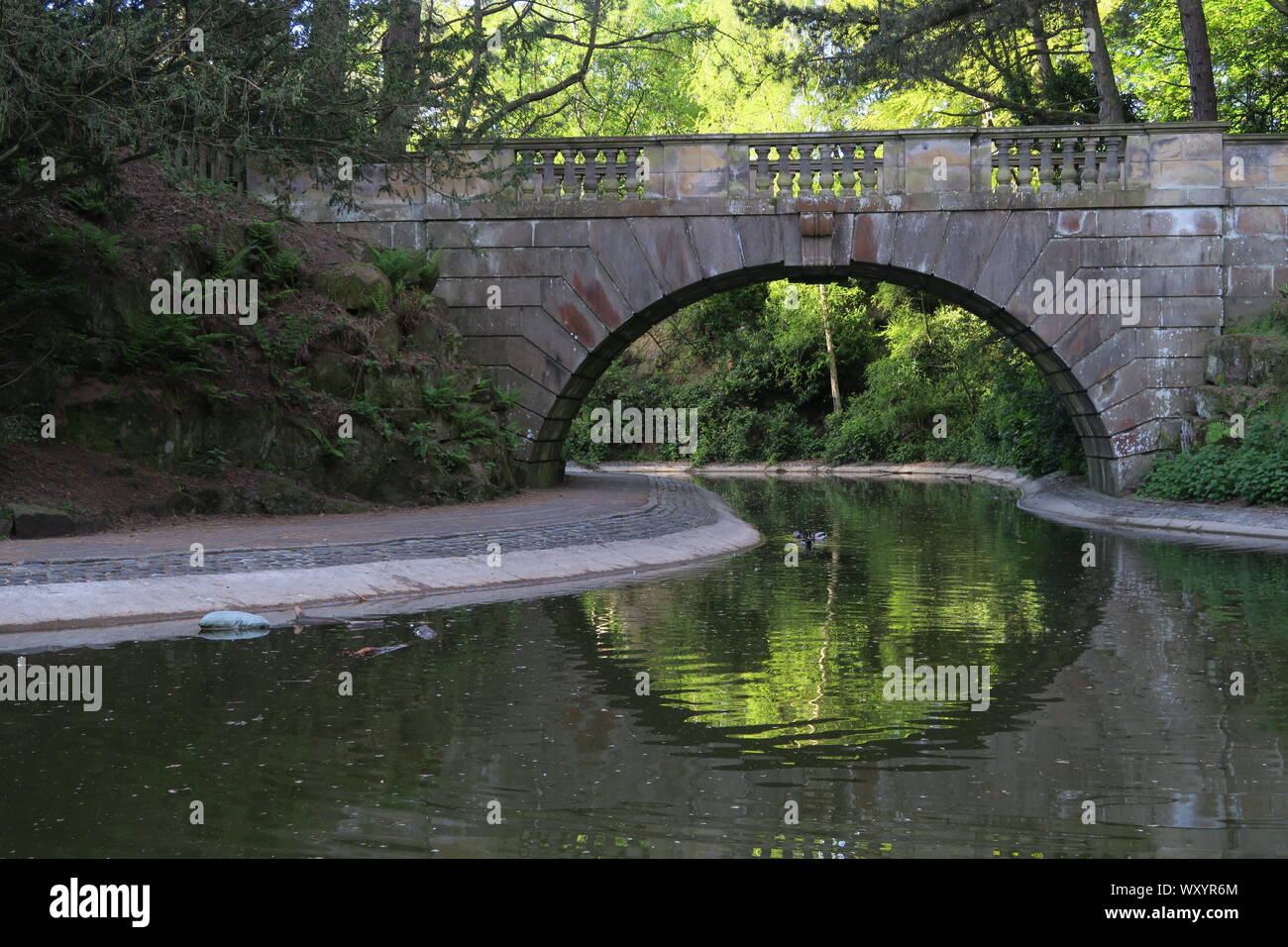peaceful scene, bridge over calm water Stock Photo - Alamy