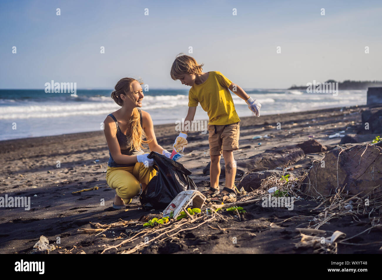 Children help clean up water hi-res stock photography and images - Alamy