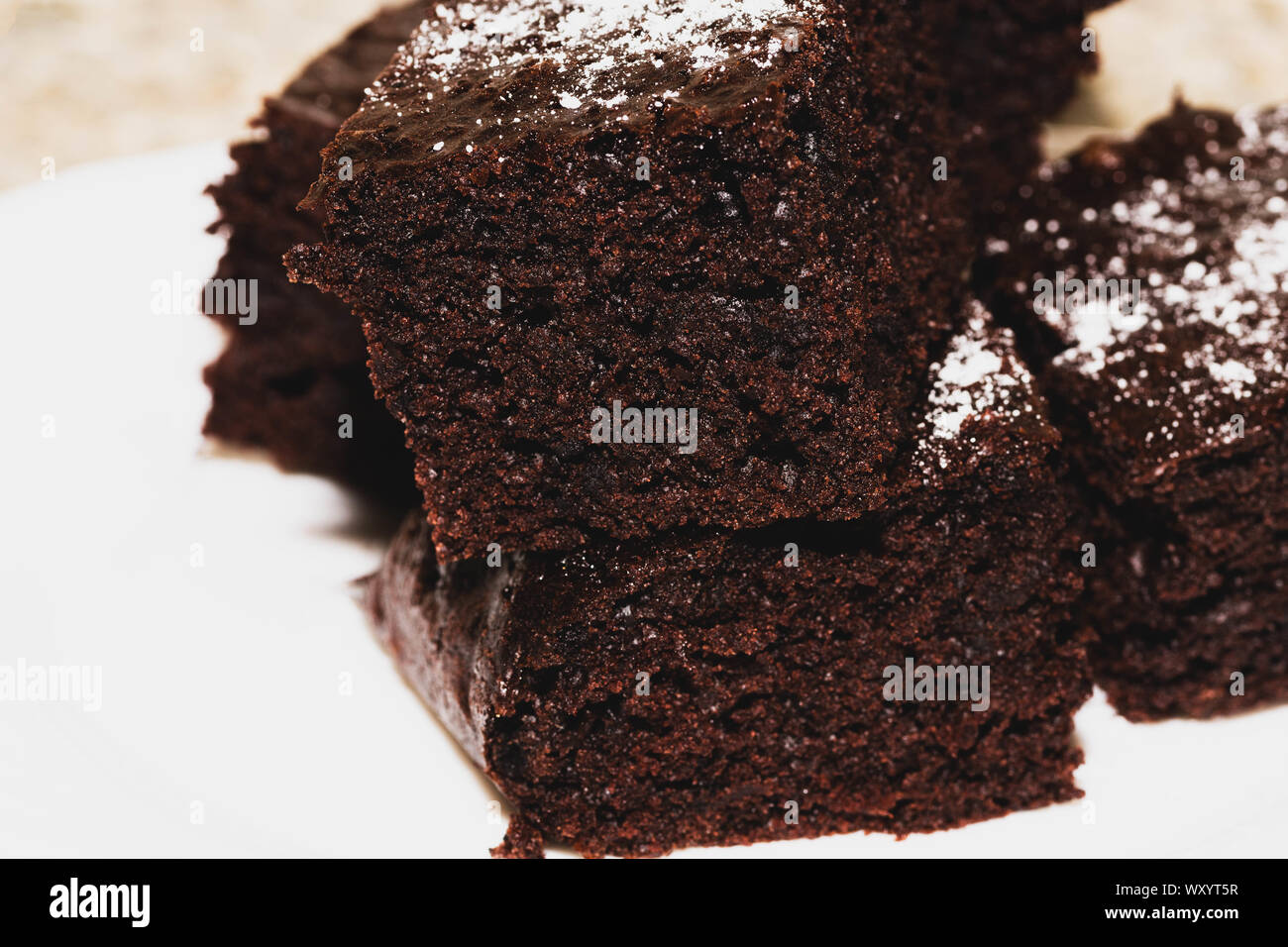 Stack of soft and delicious homemade brownie pieces Stock Photo - Alamy