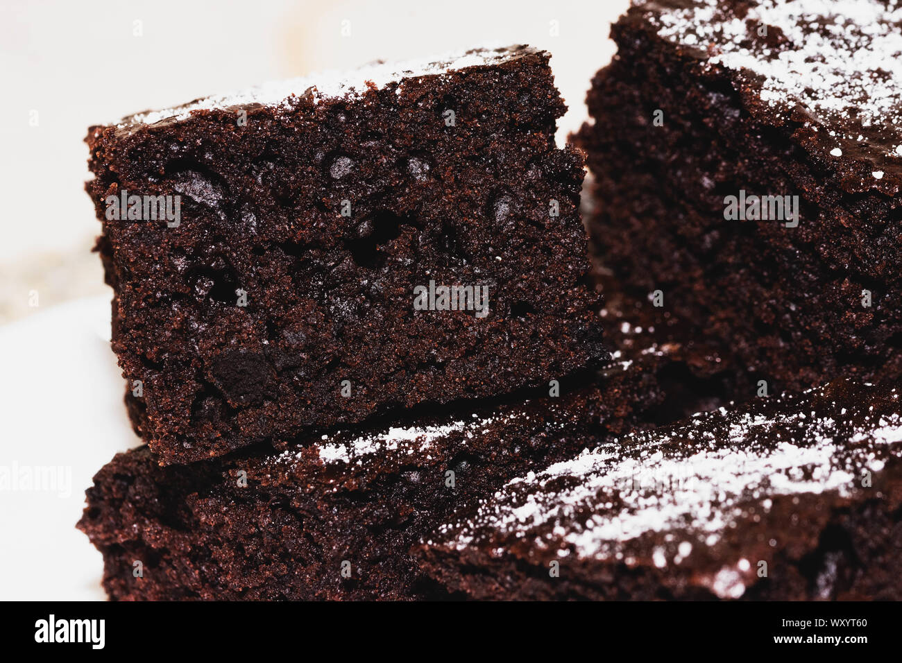 Stack of soft and delicious homemade brownie pieces Stock Photo - Alamy