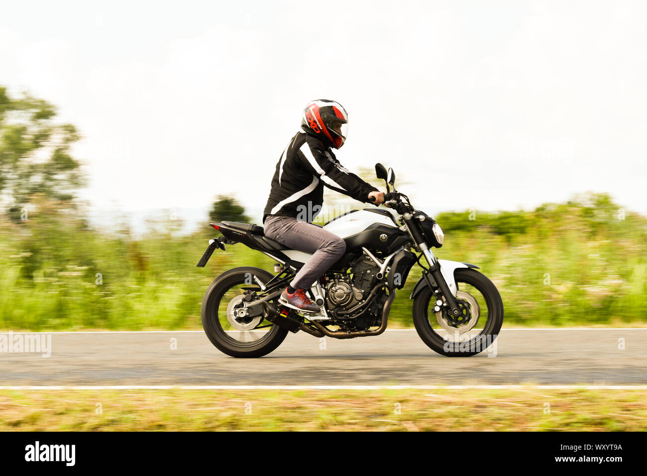 Man riding motorcycle hi-res stock photography and images - Alamy