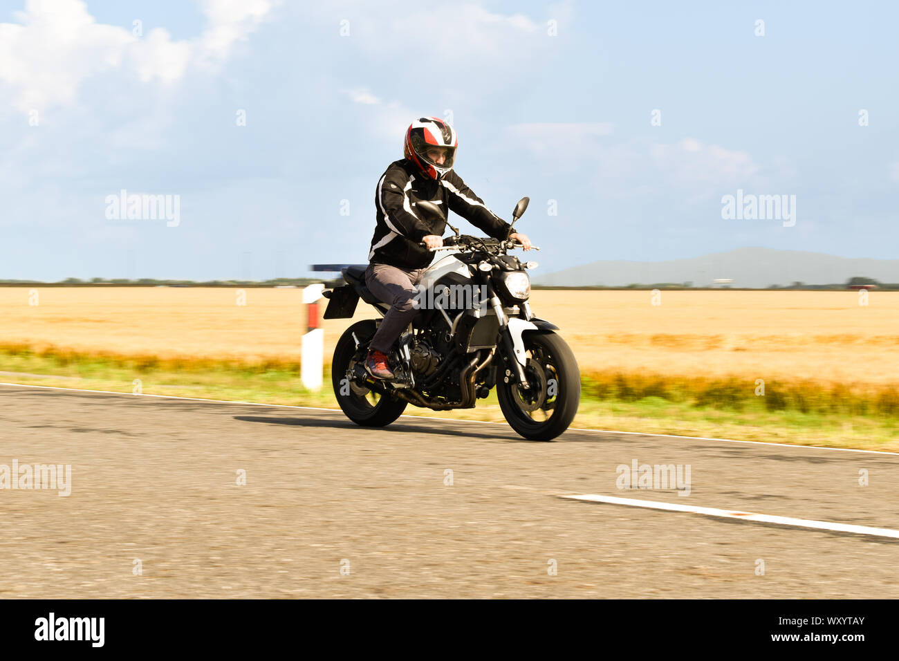 Man riding motorcycle hi-res stock photography and images - Alamy