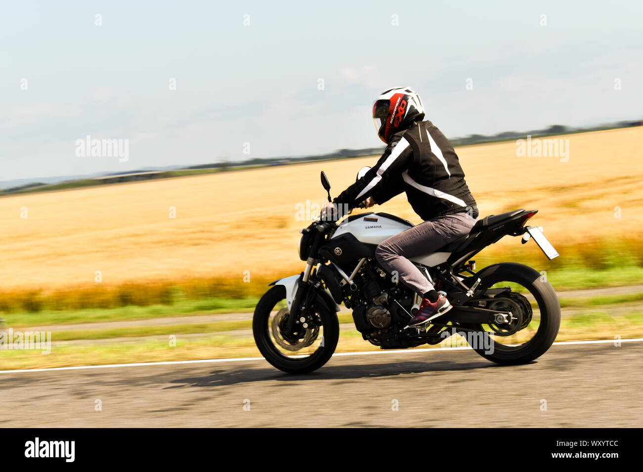 Ride motorcycle young man helmet hi-res stock photography and images ...