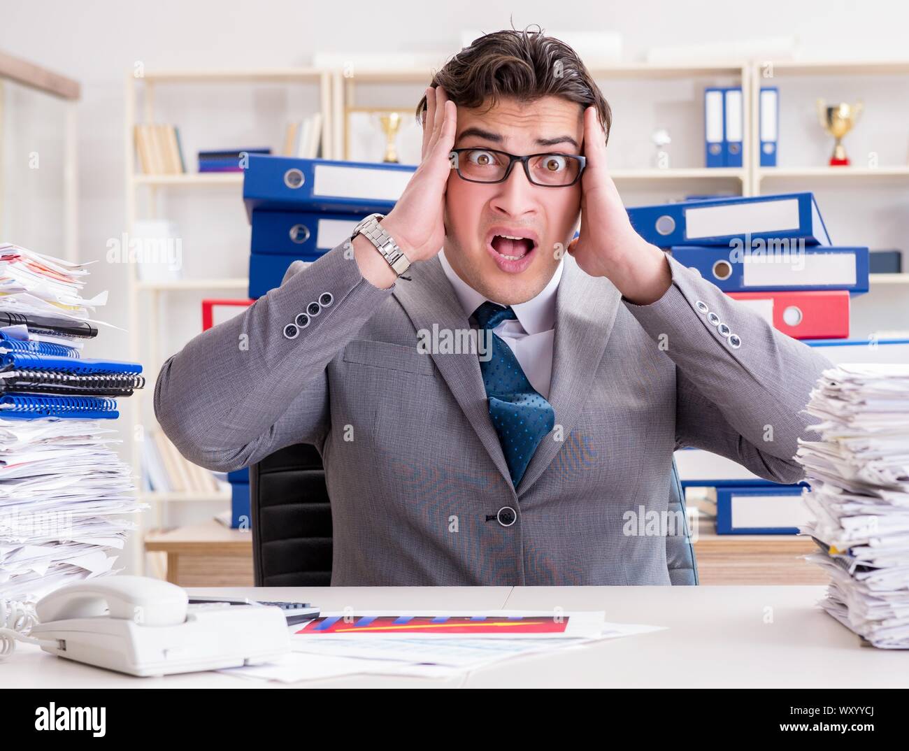 The businessman busy with much paperwork Stock Photo - Alamy