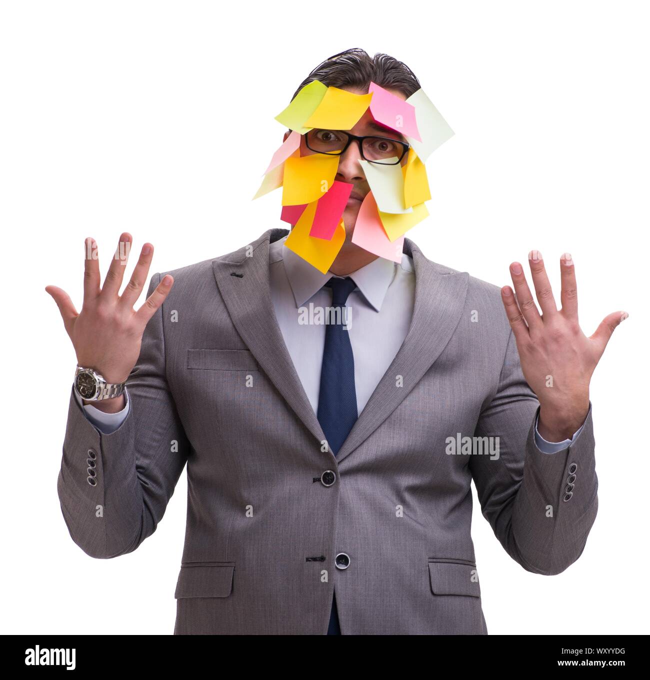 The businessman with many reminders isolated on white Stock Photo - Alamy