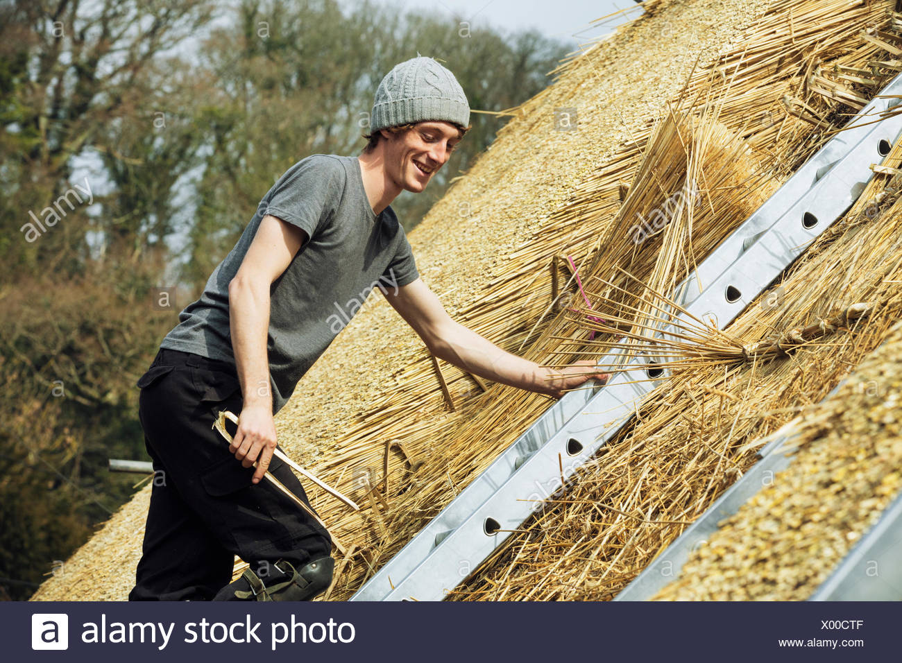 Man On Ladder Roof High Resolution Stock Photography and Images - Alamy