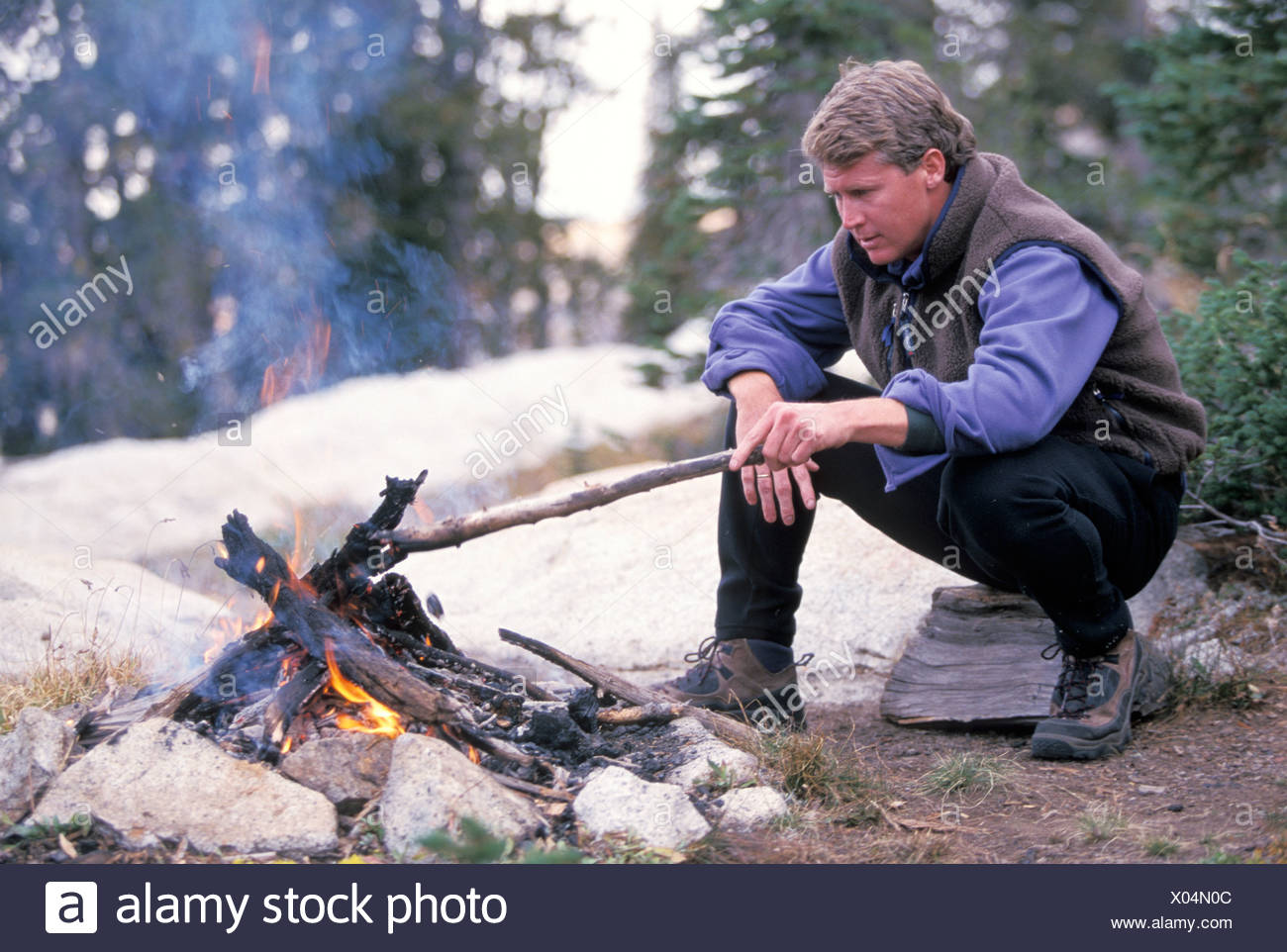 Man Stoking Fire Stock Photos & Man Stoking Fire Stock Images - Alamy