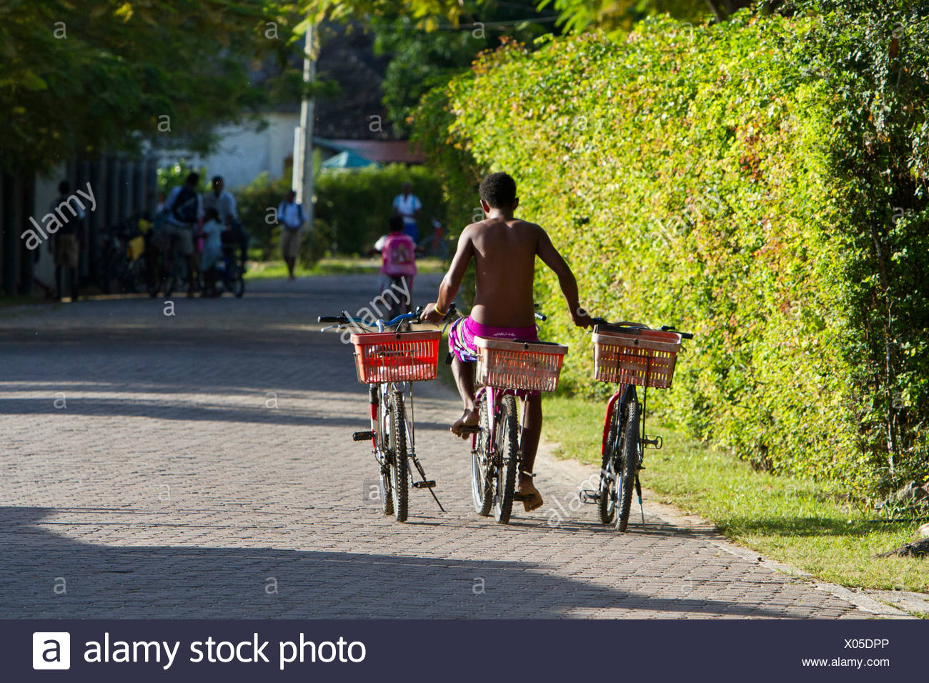 Two Boys Riding Bikes High Resolution Stock Photography and Images - Alamy
