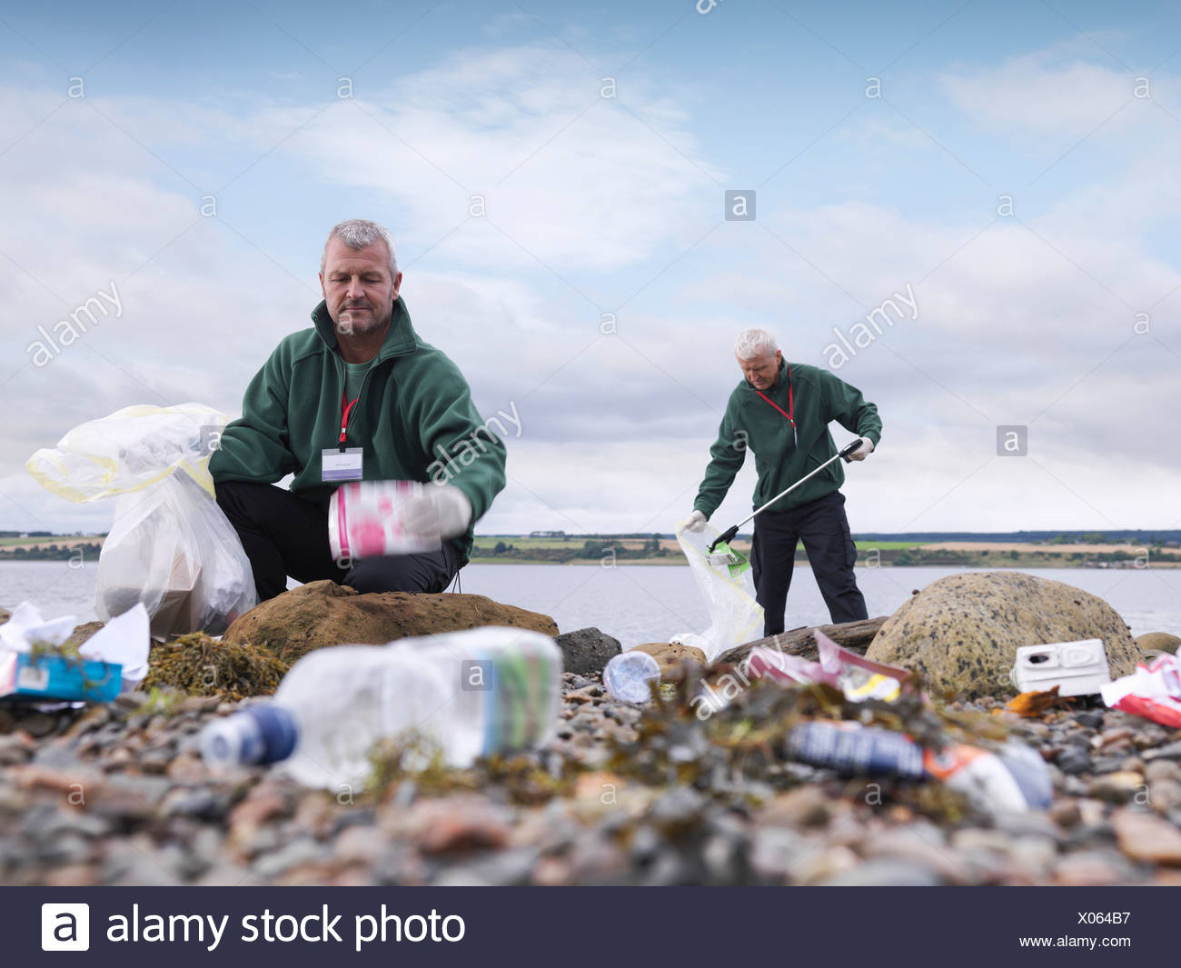 Cleaning Trash At Beach High Resolution Stock Photography and Images ...