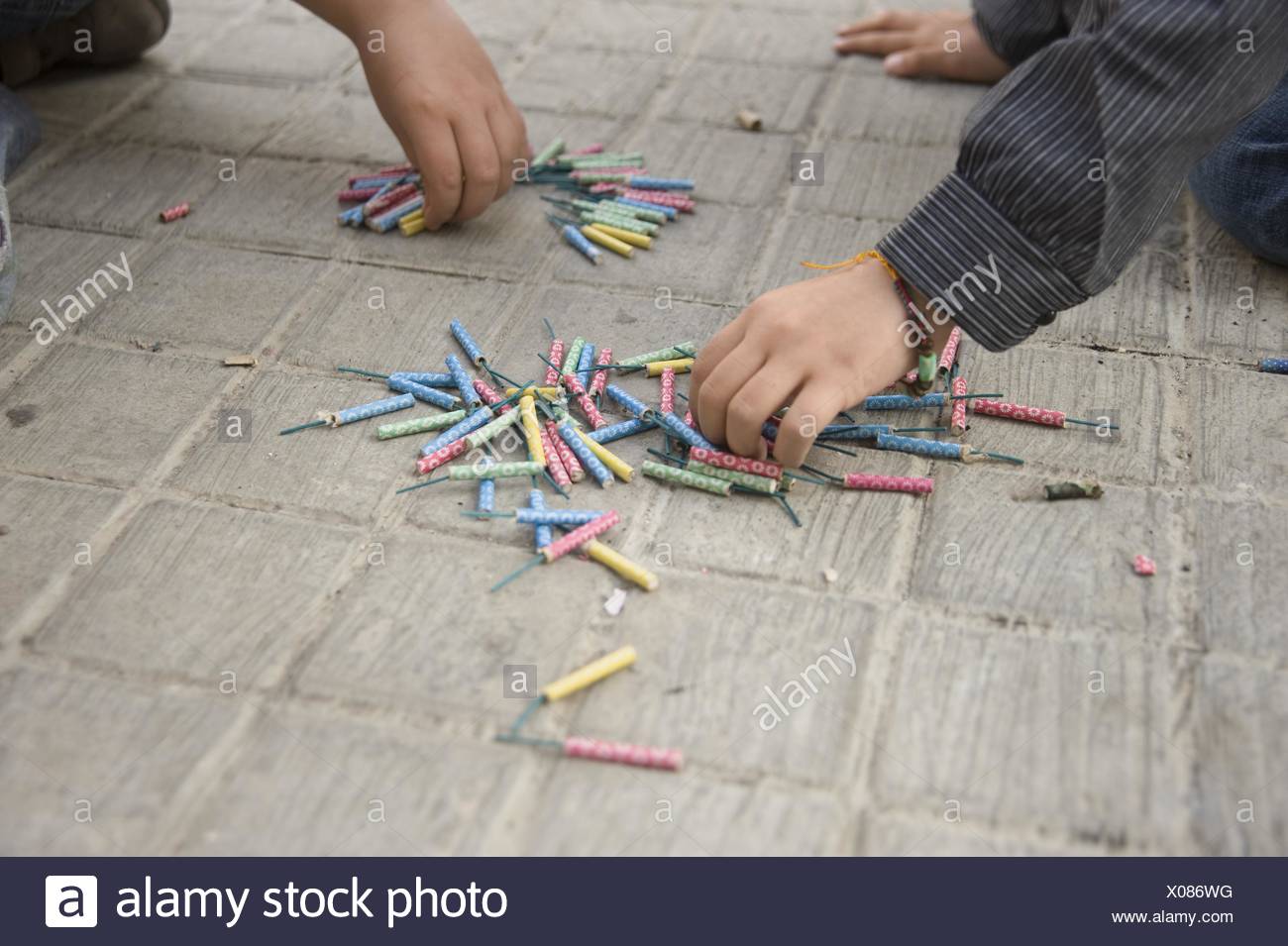 Children Playing With Firecrackers High Resolution Stock Photography ...