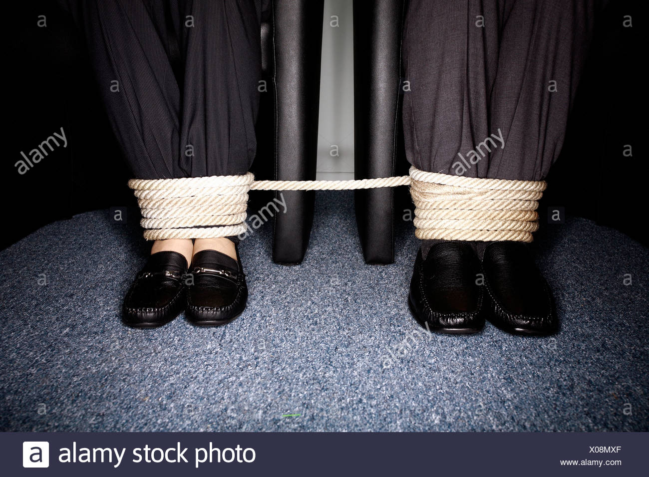 Legs Tied Rope High Resolution Stock Photography and Images - Alamy