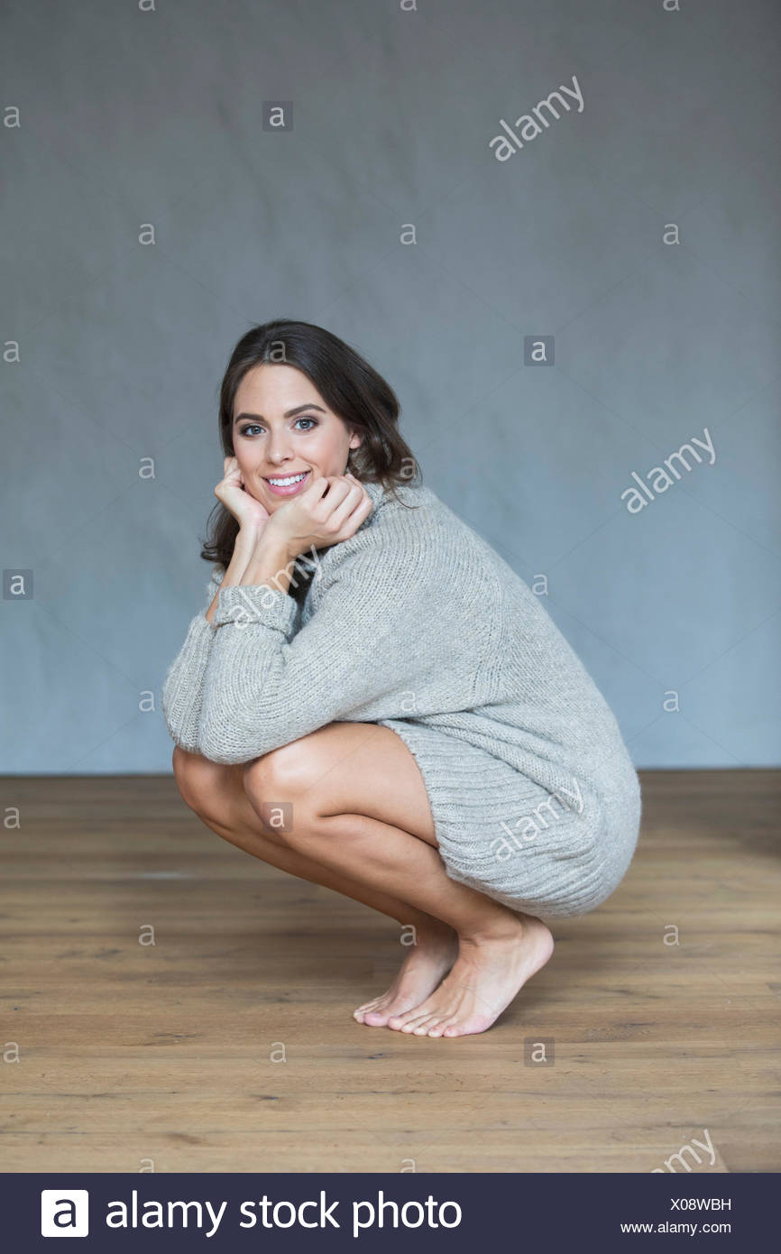 Portrait Crouching Woman Wearing Black Stock Photos & Portrait ...