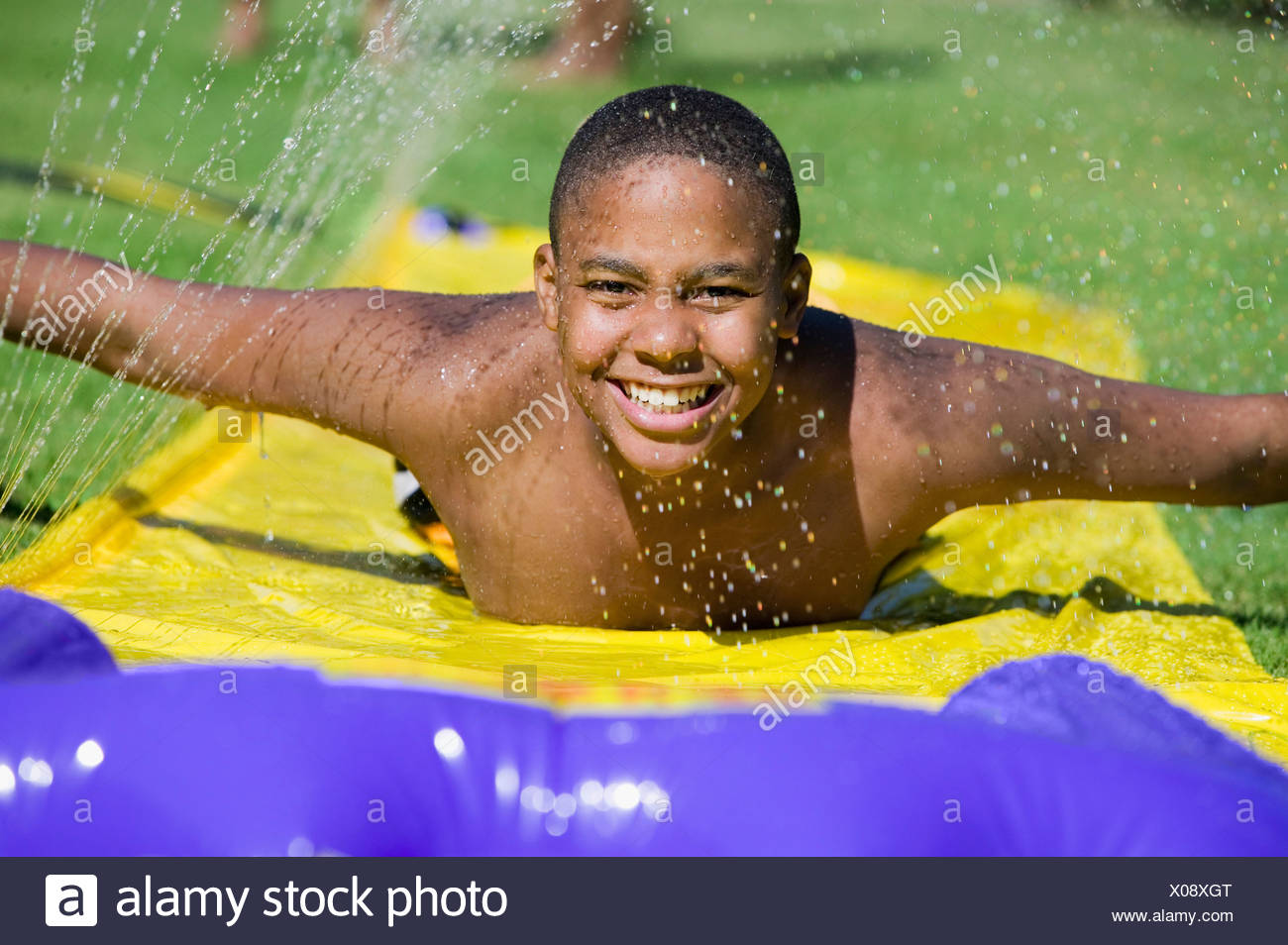Water Slide Boy Fun Stock Photos & Water Slide Boy Fun Stock Images - Alamy