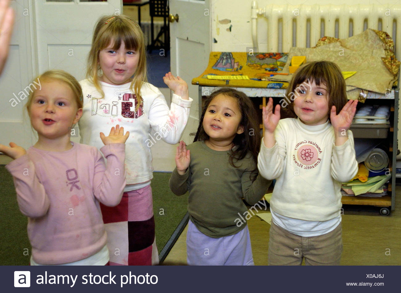 Happy Children Clapping Classroom High Resolution Stock Photography and ...