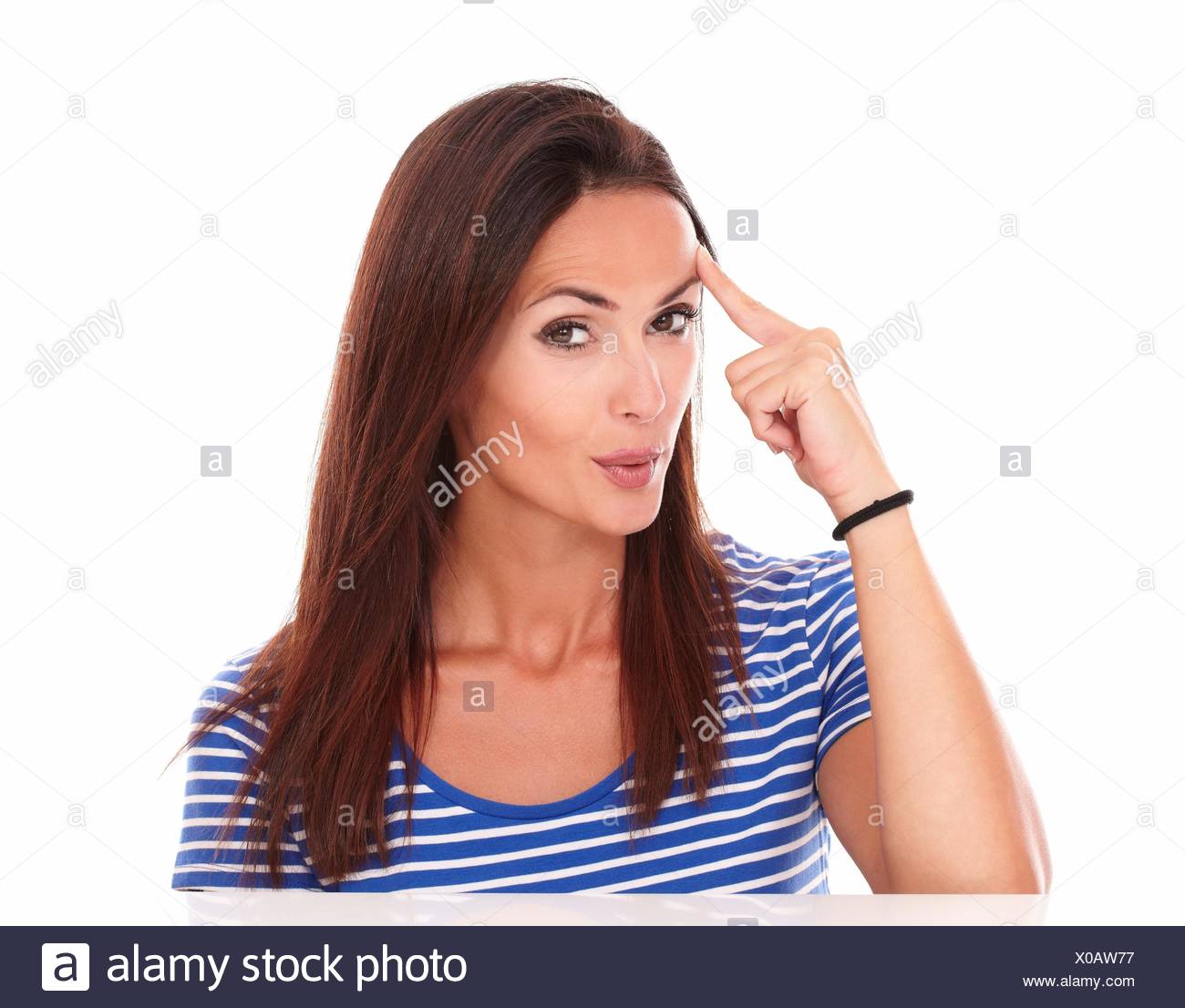 Beautiful Woman Pointing Forehead High Resolution Stock Photography and ...