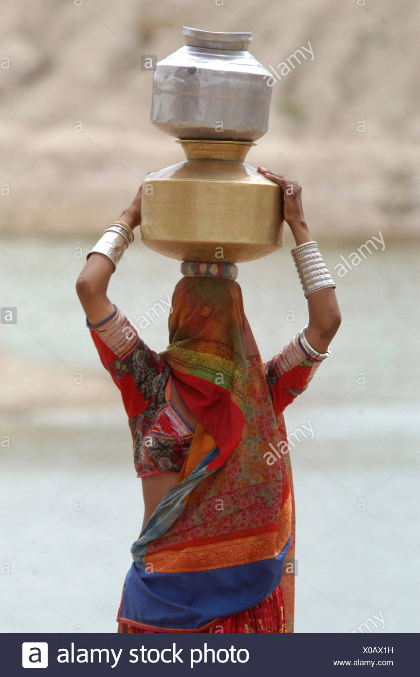 Tribal Women Carrying Water Pots High Resolution Stock Photography and ...