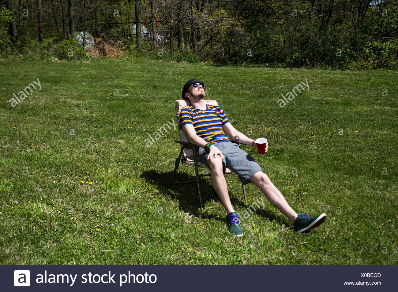 Men Sunbathing Stock Photos & Men Sunbathing Stock Images - Alamy