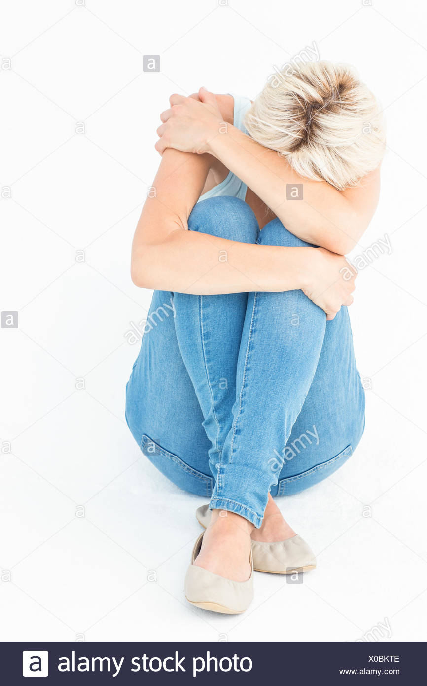 Woman Crouching Scared High Resolution Stock Photography and Images - Alamy