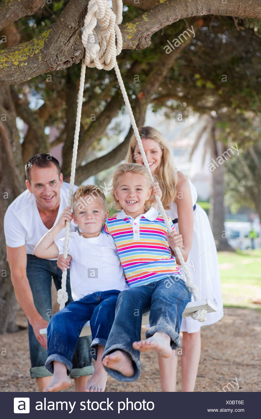 Parents Pushing Their Children High Resolution Stock Photography and ...
