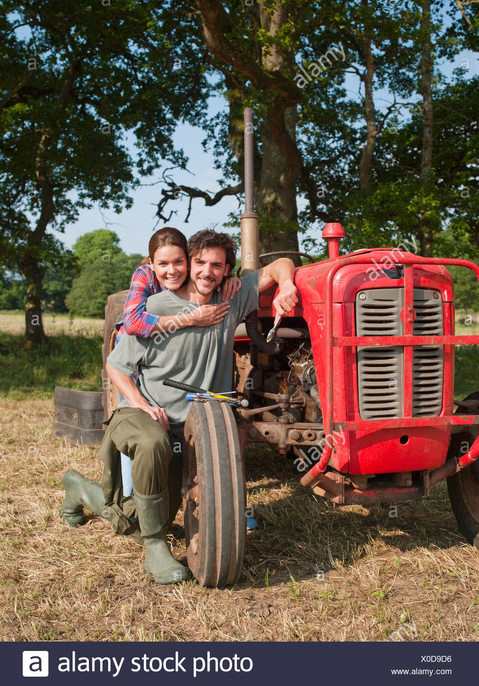 Farmer Posing With Tractor High Resolution Stock Photography and Images ...