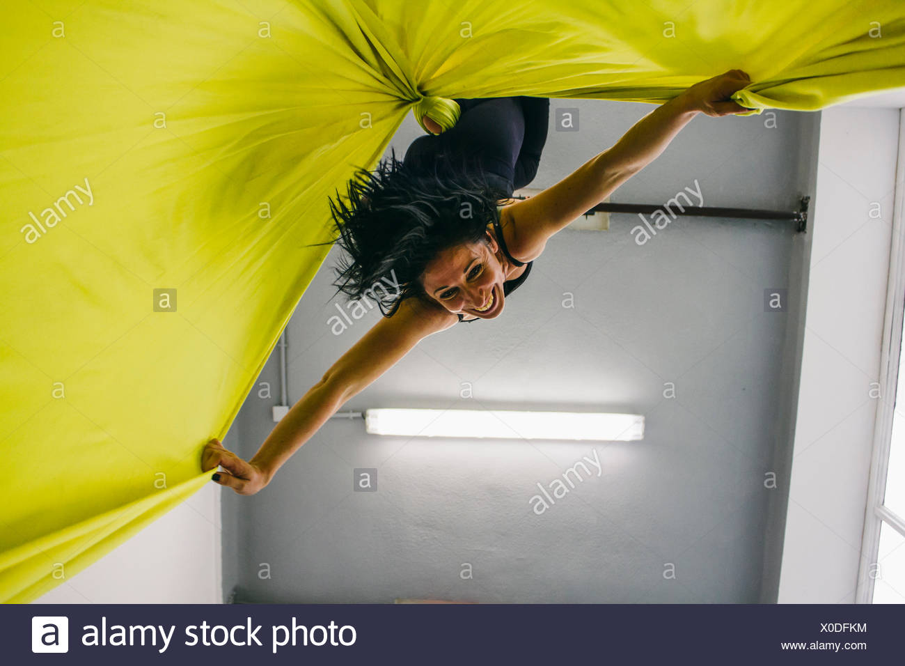 Woman Hanging Upside Down From Stock Photos & Woman Hanging Upside Down ...