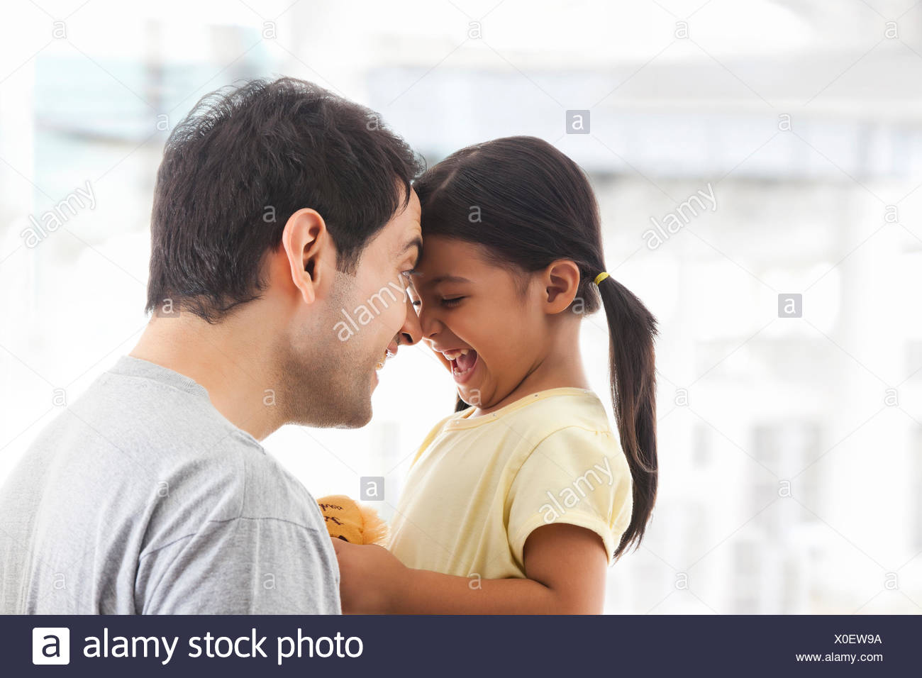 Two People Foreheads Touching Stock Photos & Two People Foreheads ...