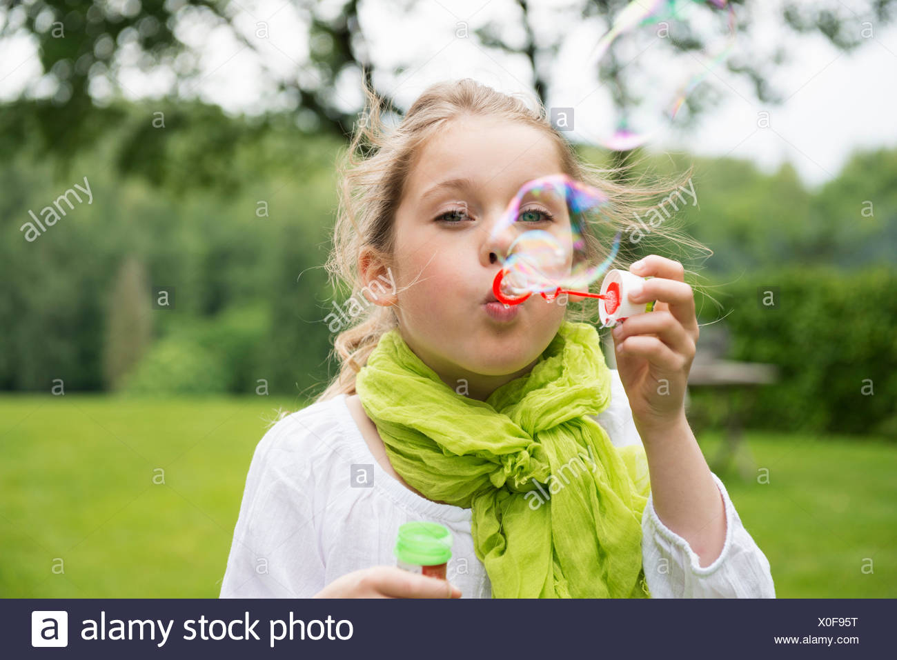 Children Blowing Bubbles High Resolution Stock Photography and Images ...