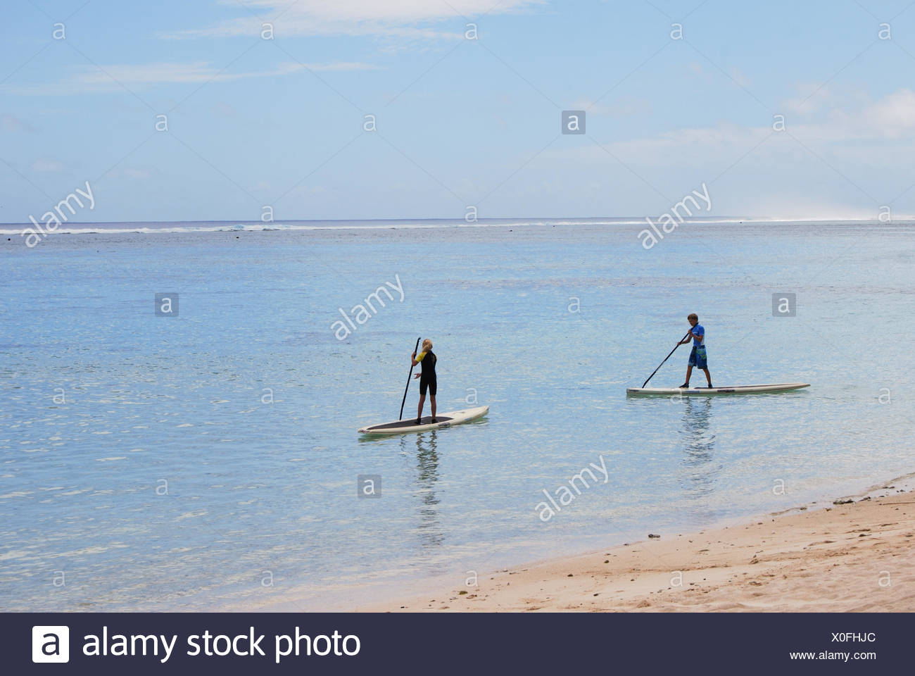 Boy Paddle Boarding High Resolution Stock Photography and Images - Alamy