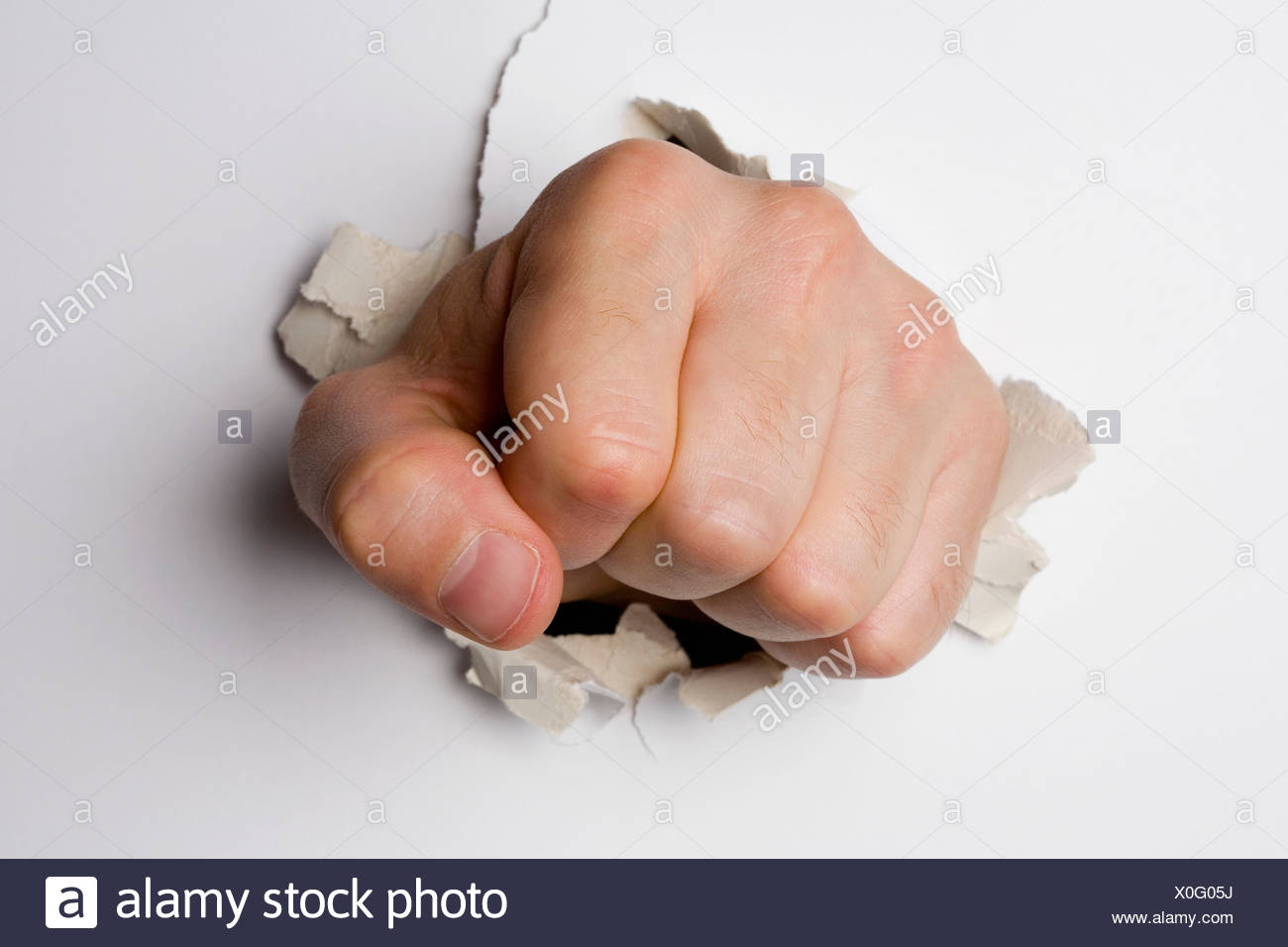 Fist Punching Through Wall High Resolution Stock Photography and Images ...