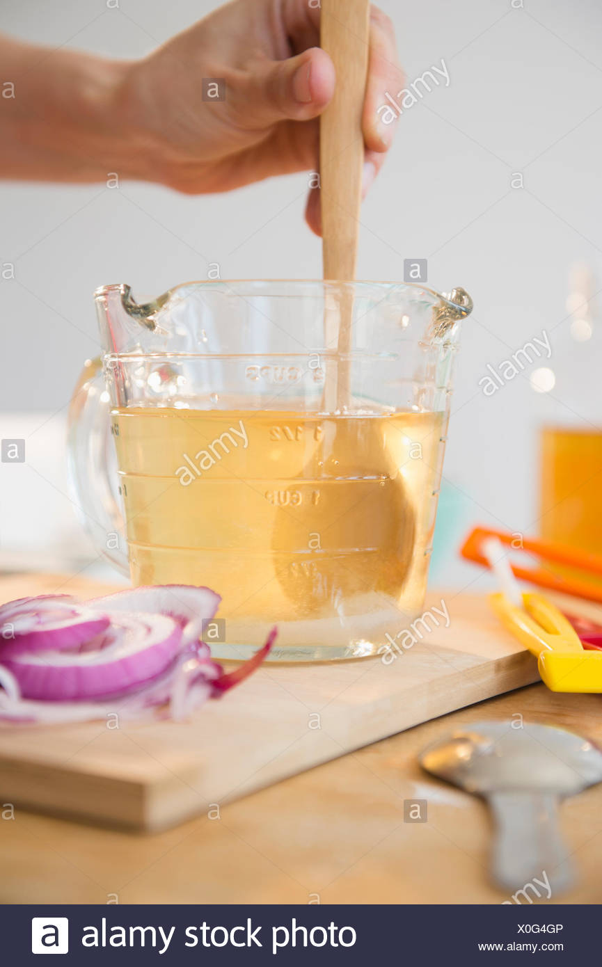 Studio Shot Hand Stirring Liquid High Resolution Stock Photography and ...