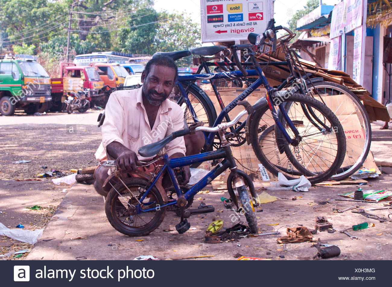 Repairing Bicycle India Stock Photos & Repairing Bicycle India Stock ...