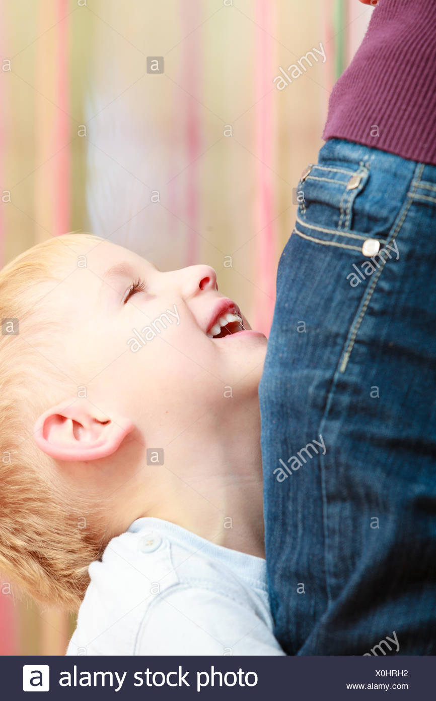 Child Hugging Parent Leg Stock Photos & Child Hugging Parent Leg Stock ...