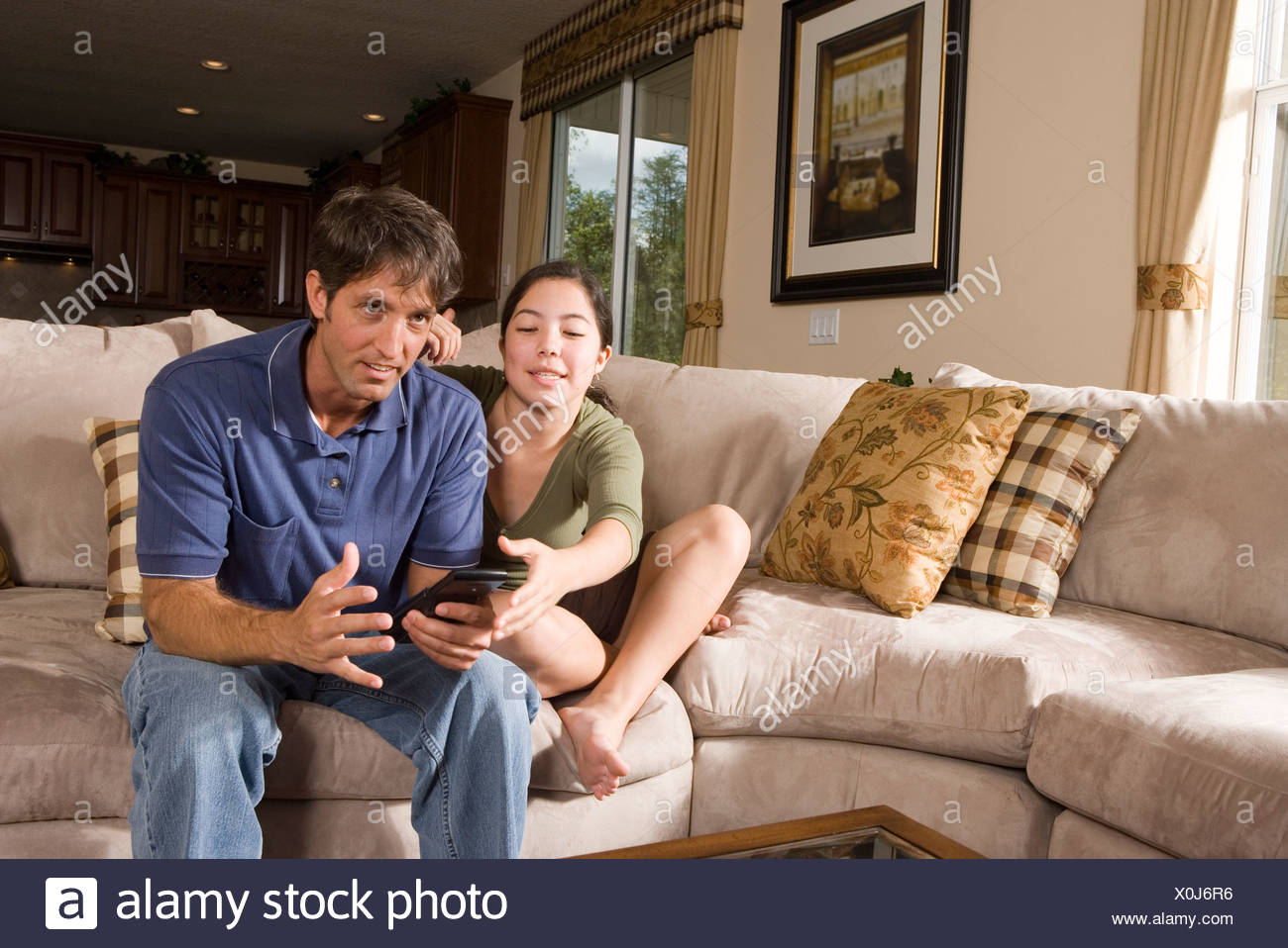 Fighting Over The Remote Control High Resolution Stock Photography and ...