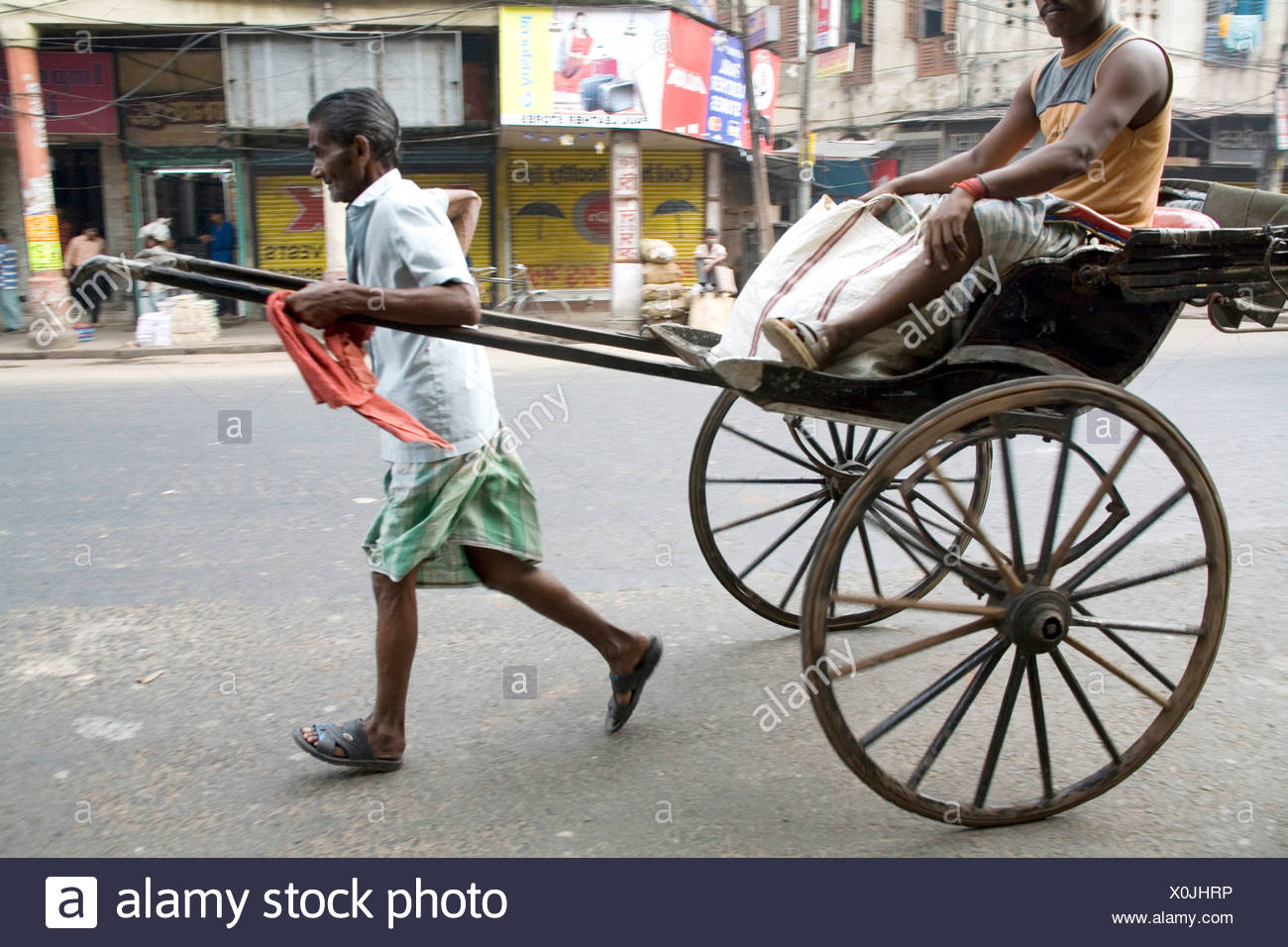 Hand Rickshaw Puller Kolkata High Resolution Stock Photography and ...