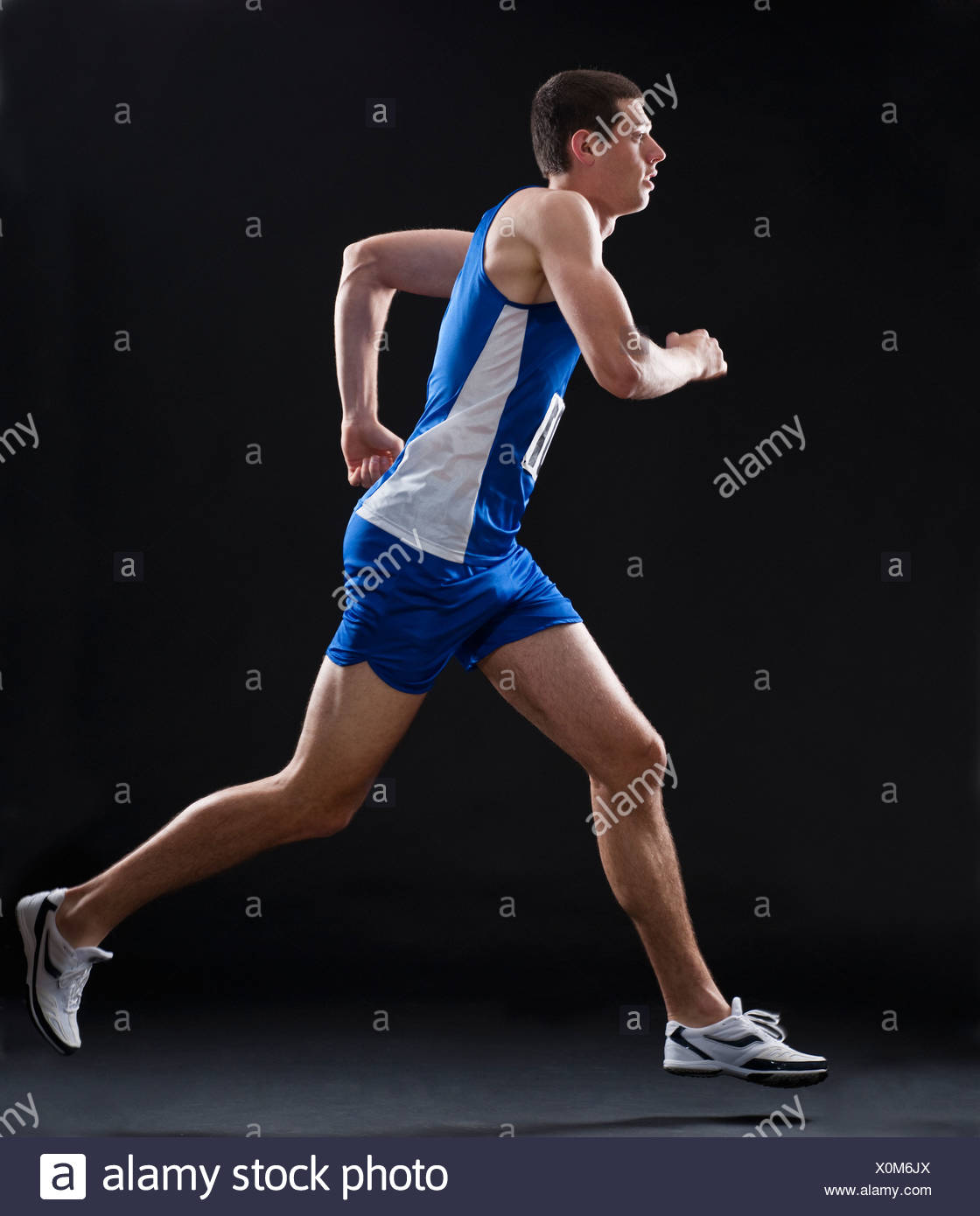 Young Muscular Athlete Male Running High Resolution Stock Photography ...