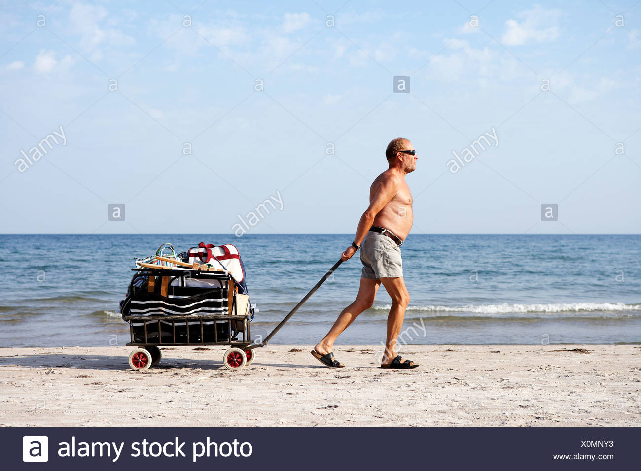 Man Pulling Cart Stock Photos & Man Pulling Cart Stock Images - Alamy